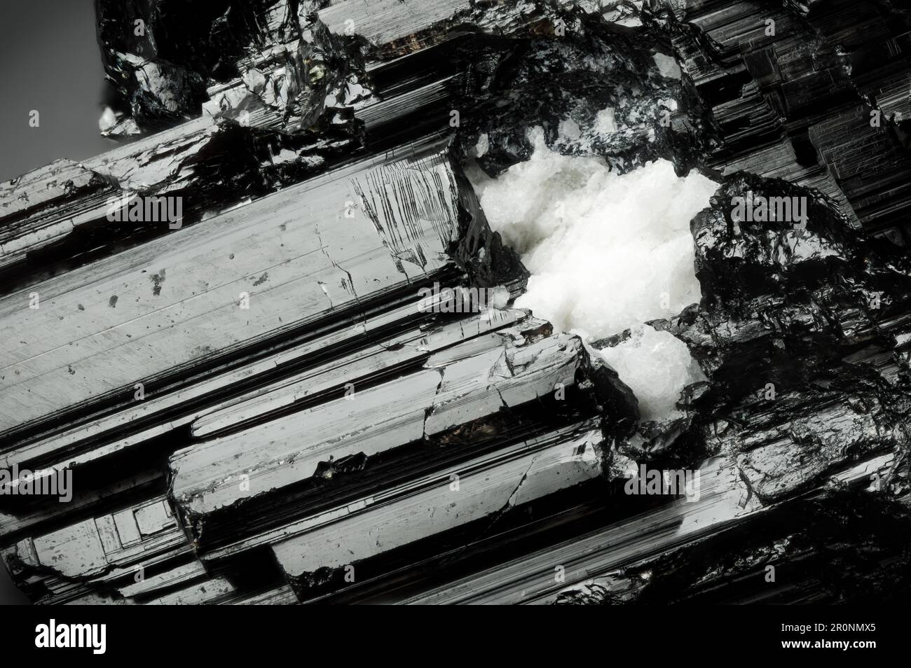 Schorl (black tourmaline) crystal structure. macro detail texture ...