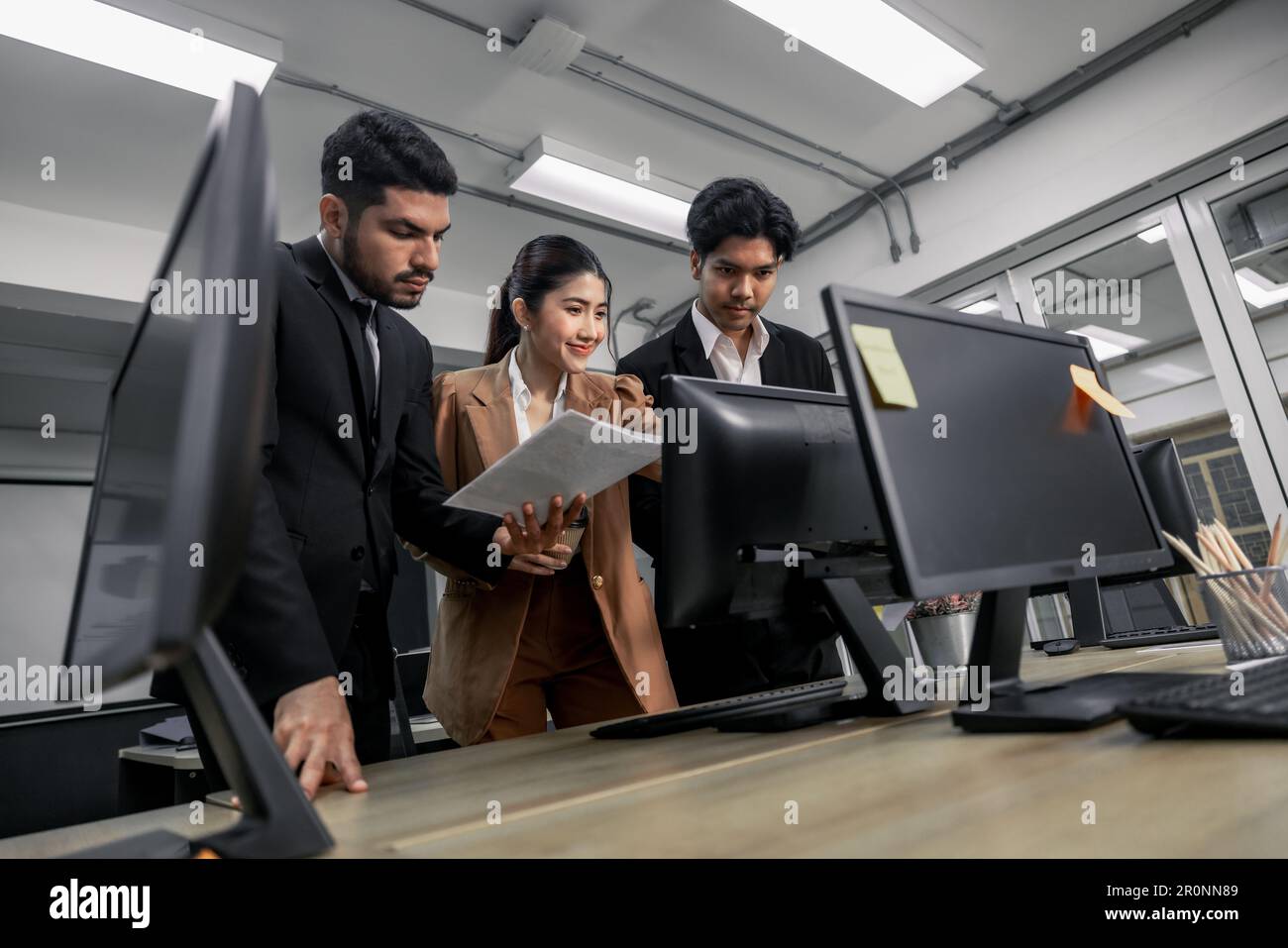 Financial advisors collaborate to assess a company's financial ...