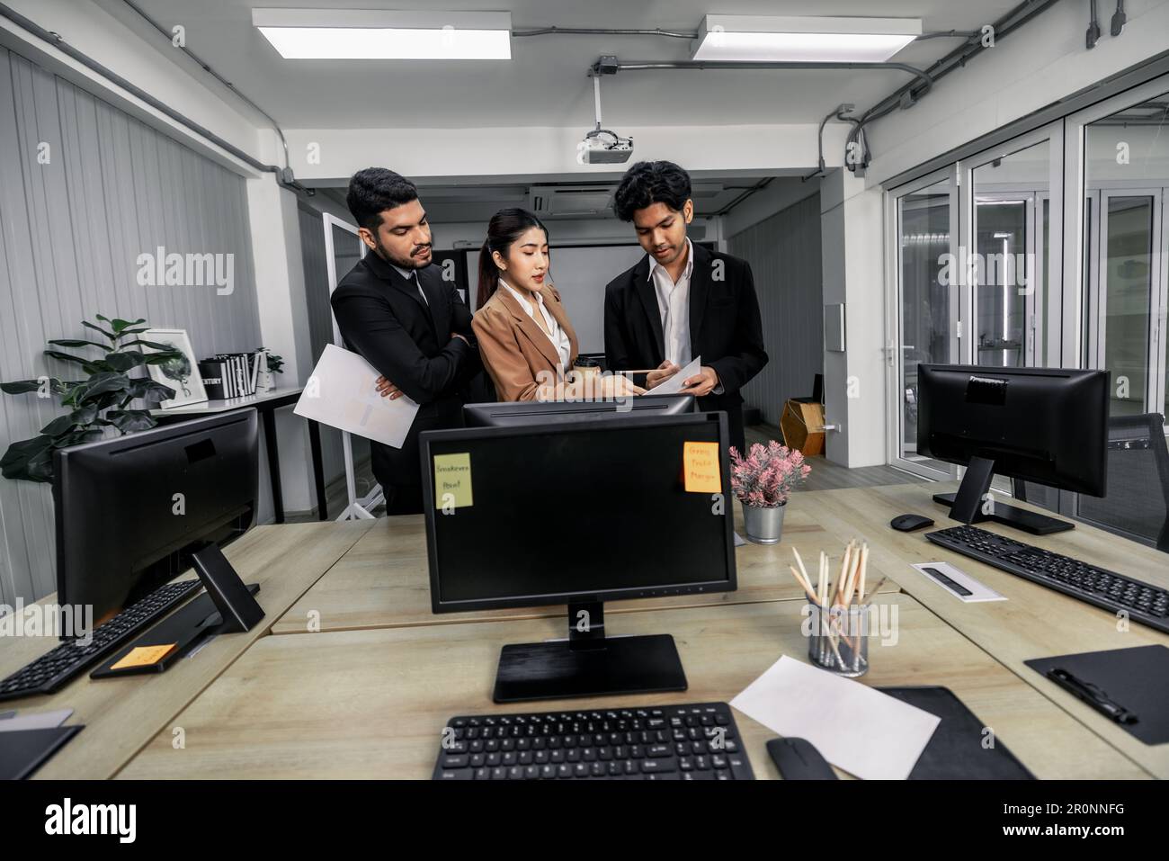 Financial advisors collaborate to assess a company's financial ...