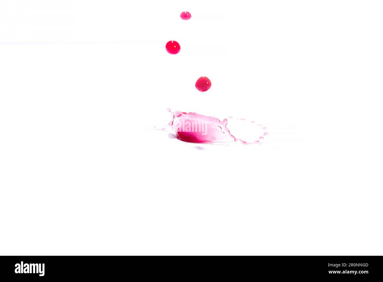 Red water splashes On a white background, photography. Red water ...