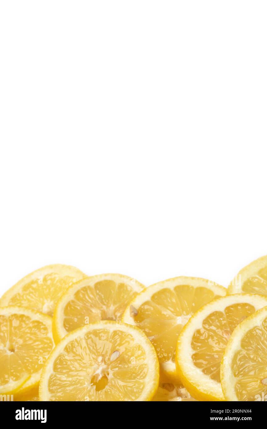 vertical overlapping lemon slices footer on white background with copy space Stock Photo - Alamy