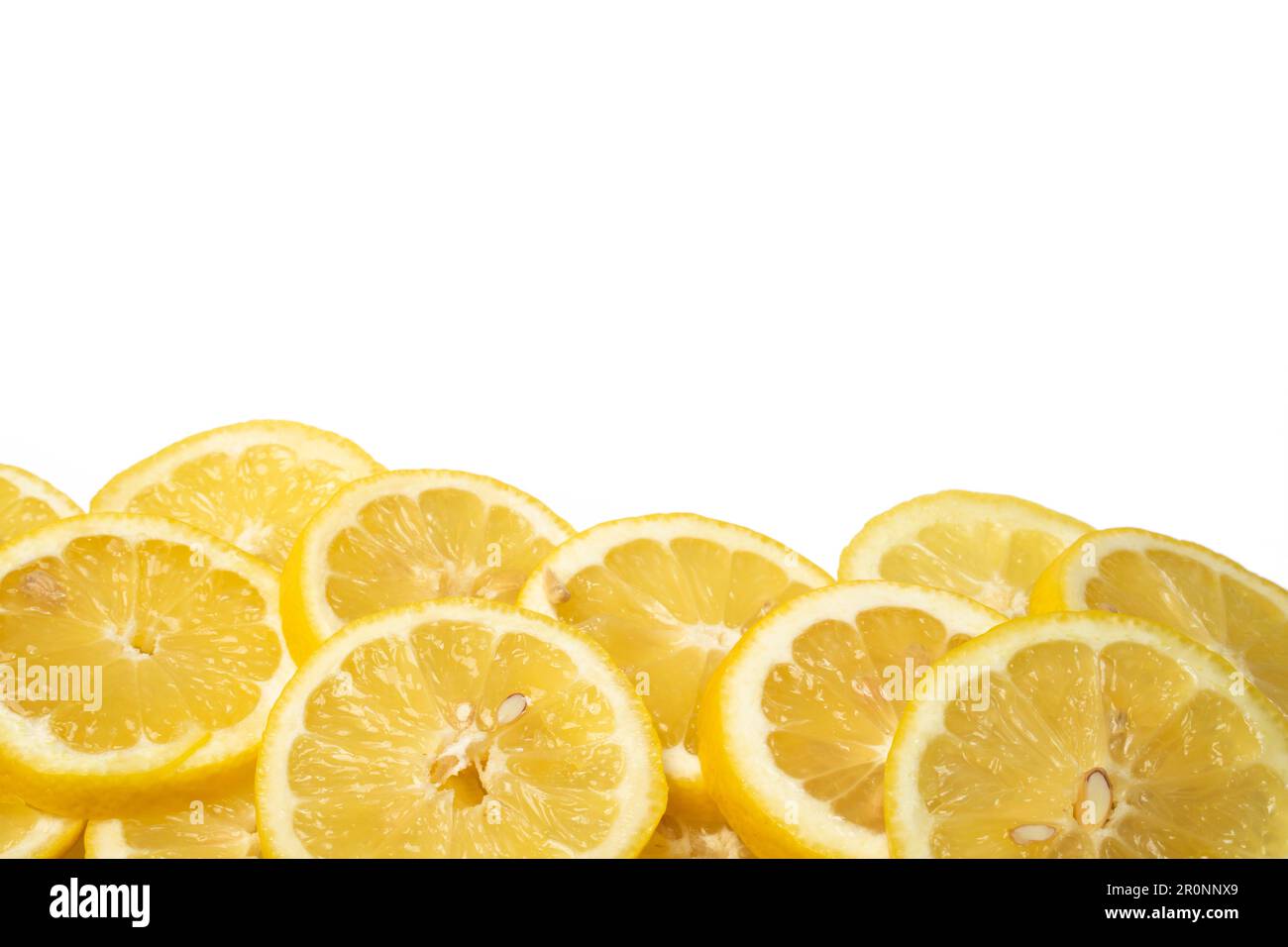 vertical overlapping lemon slices footer on white background with copy space Stock Photo - Alamy