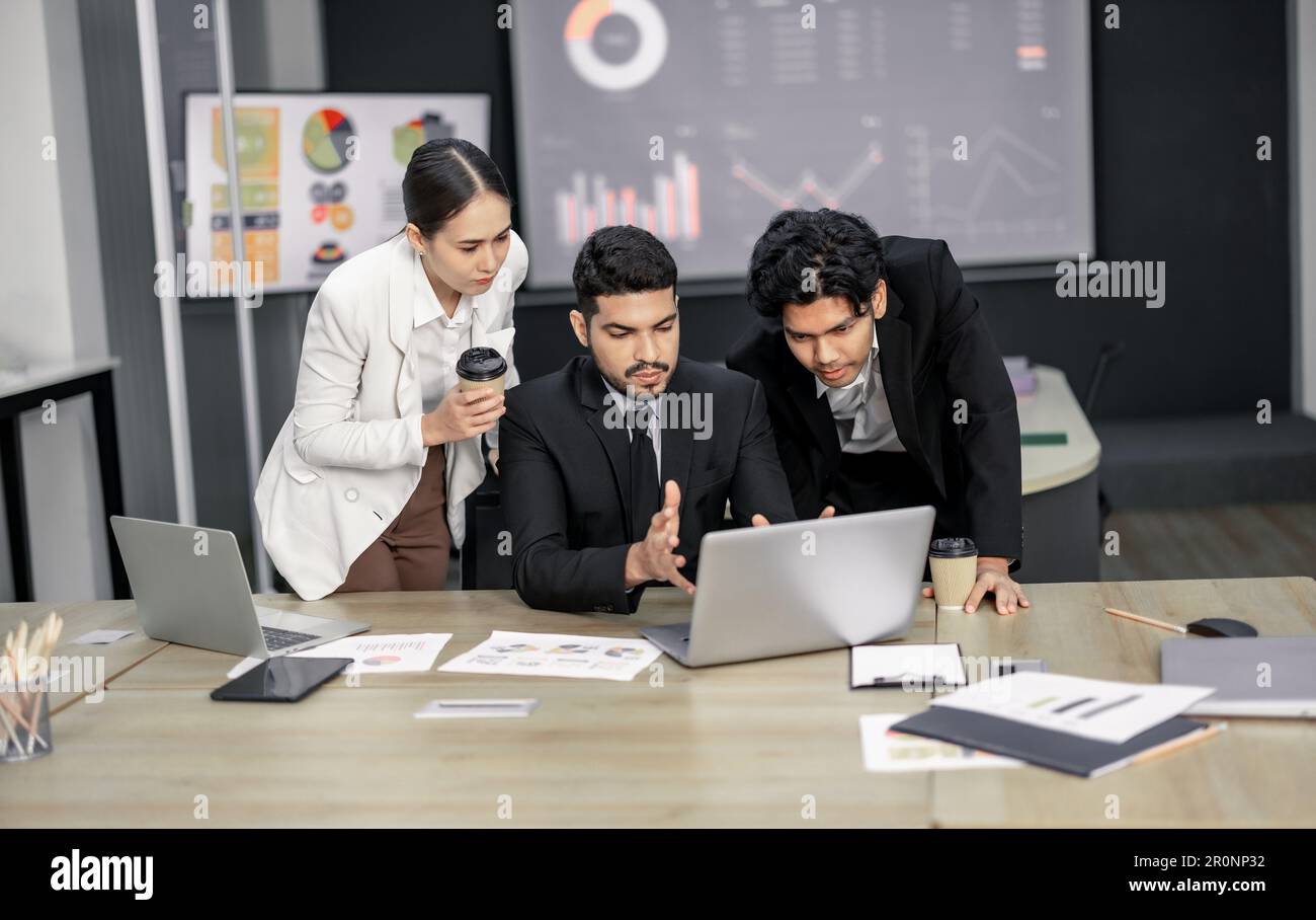 Financial advisors collaborate to assess a company's financial ...