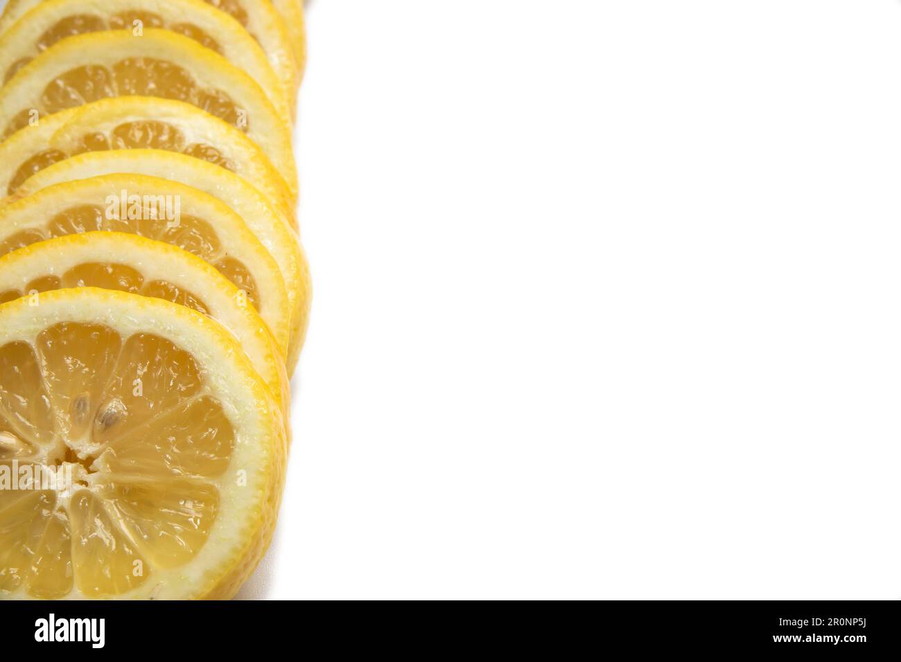 vertical overlapping lemon slices footer on white background with copy space Stock Photo - Alamy