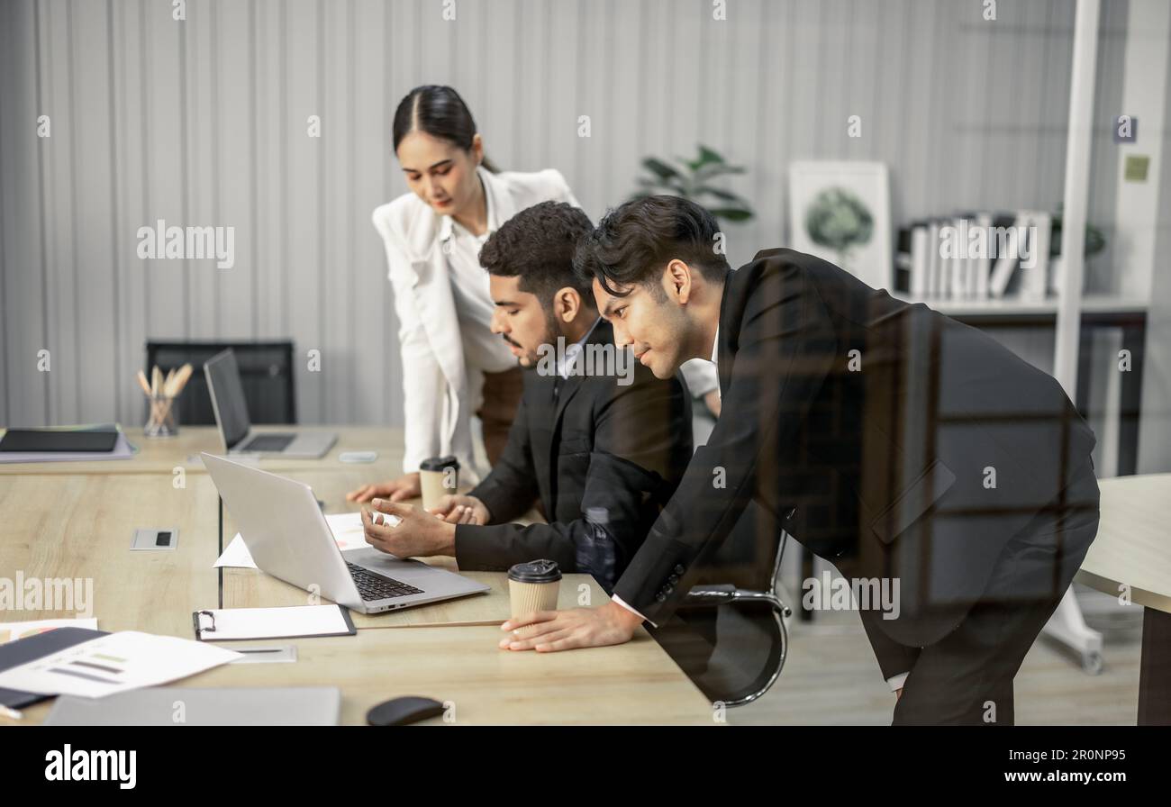 Financial advisors collaborate to assess a company's financial ...