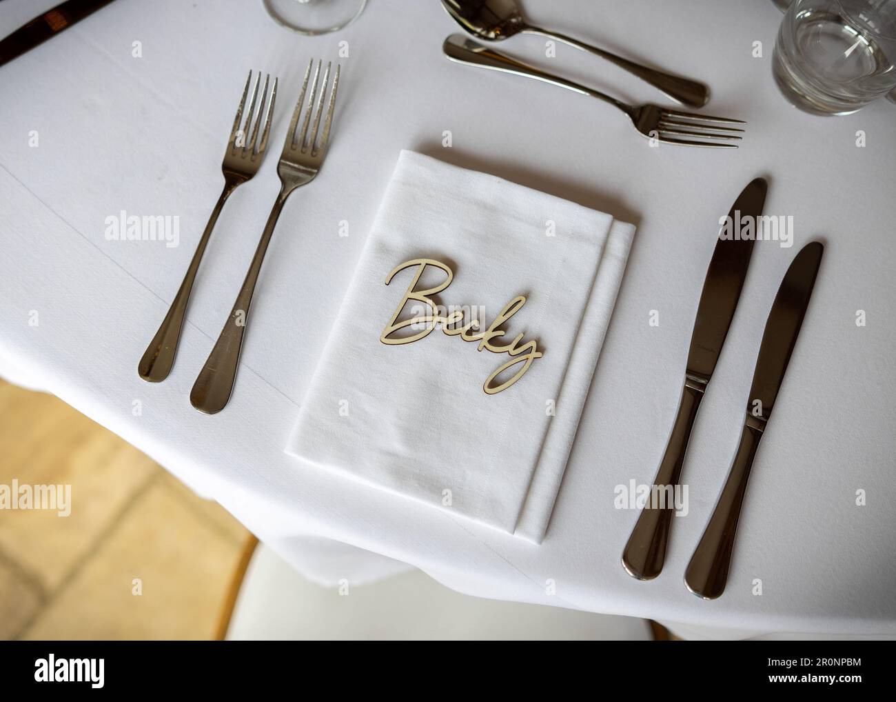 Table places with wooden name place cards Becky Stock Photo - Alamy