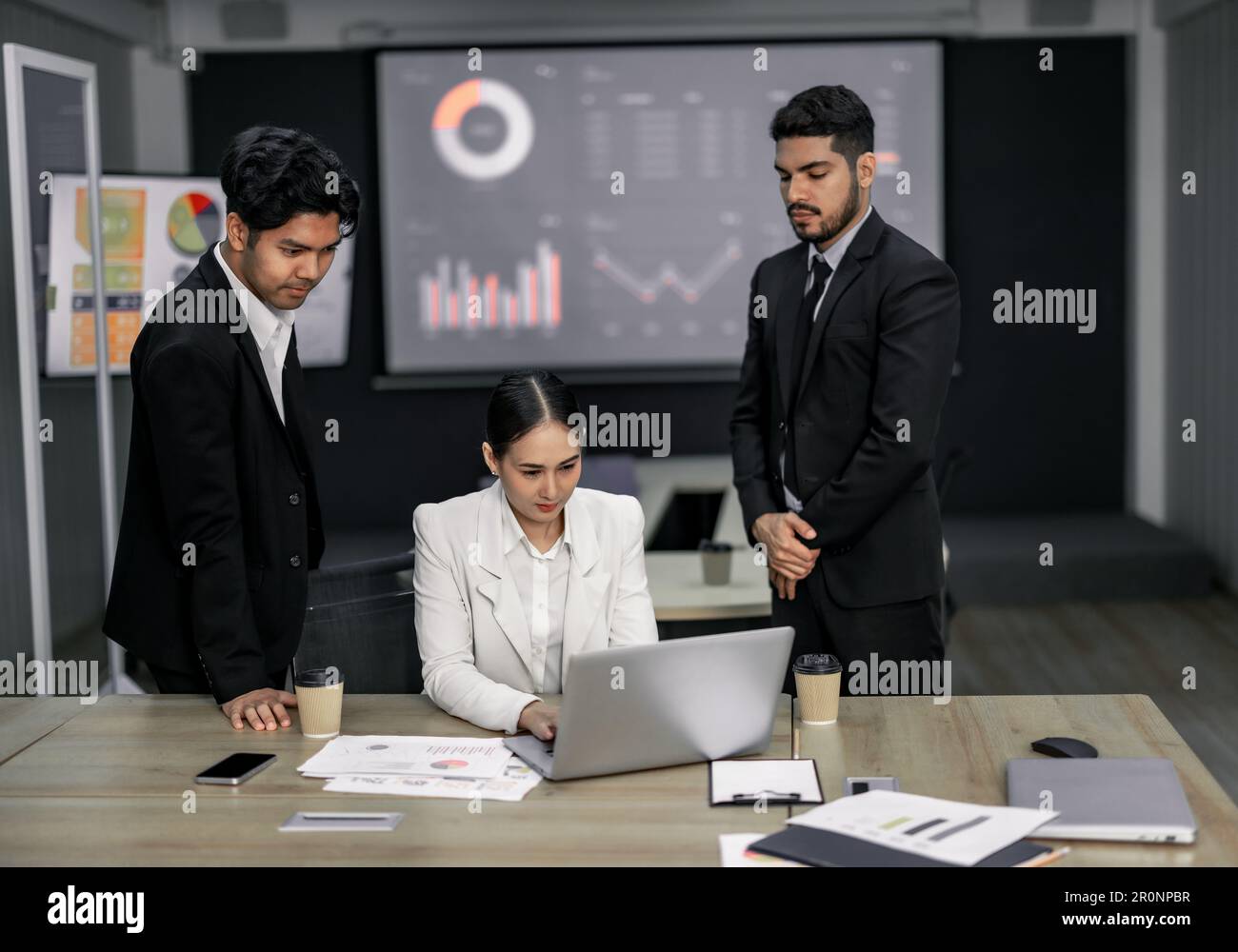Financial advisors collaborate to assess a company's financial ...