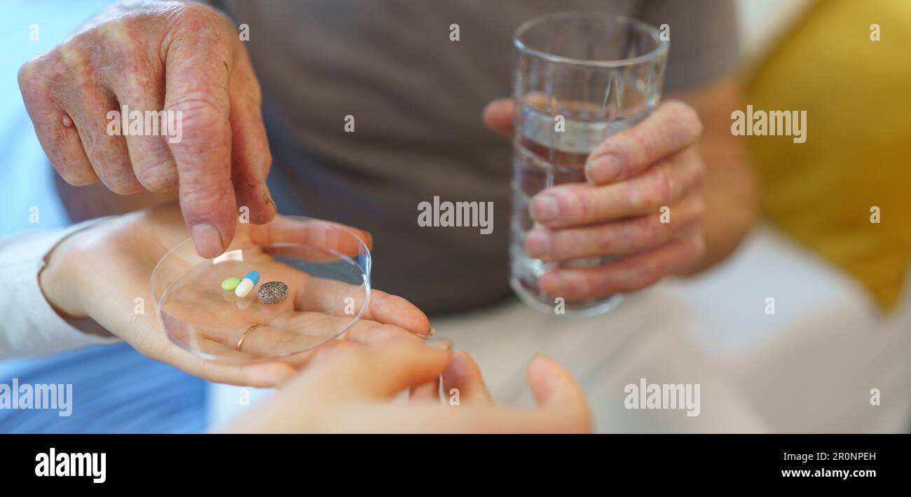 Unrecognizable person taking pills hi-res stock photography and images ...