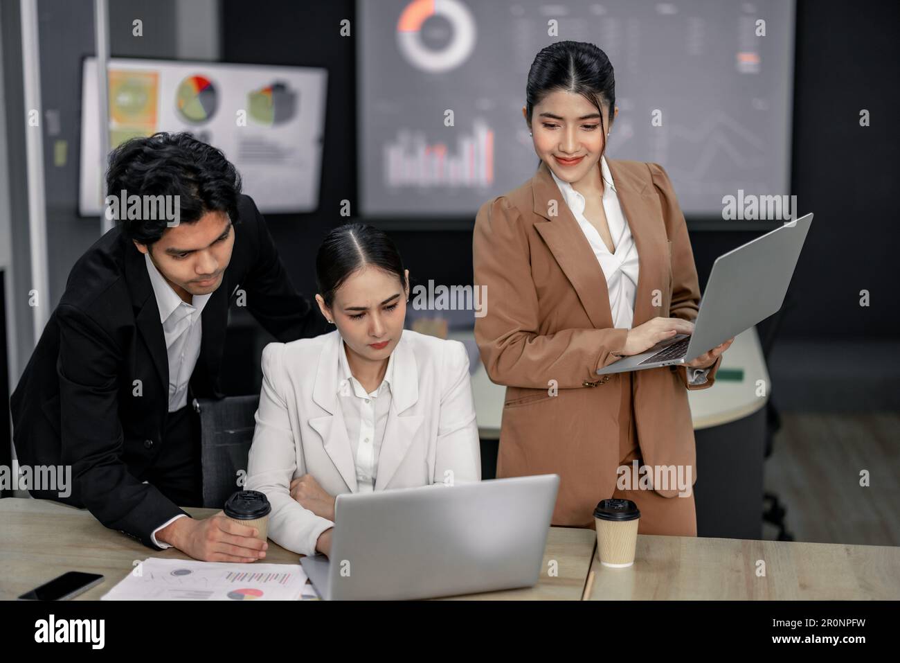 Financial advisors collaborate to assess a company's financial ...