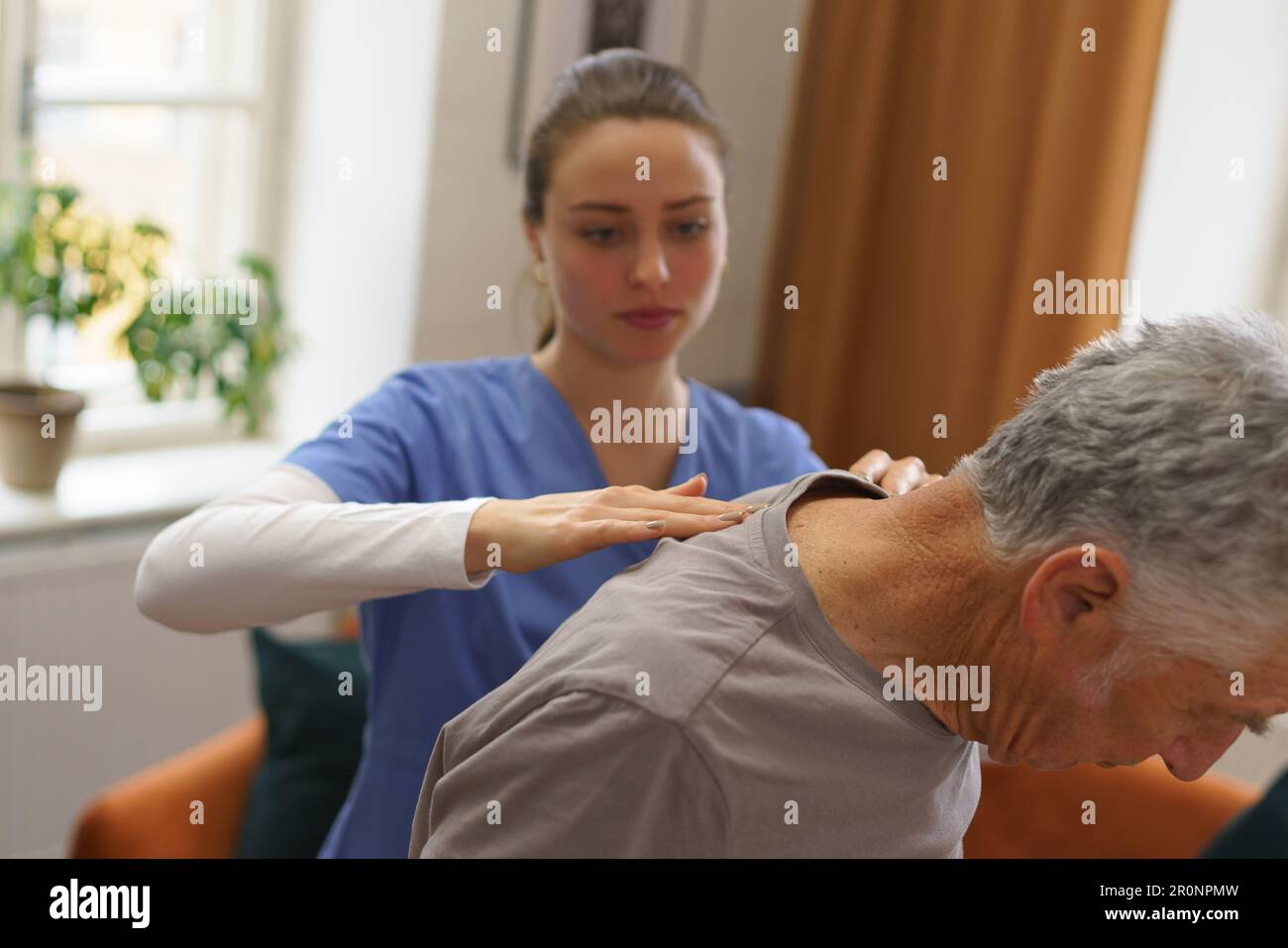 Young nurse doing exercise hi-res stock photography and images - Alamy