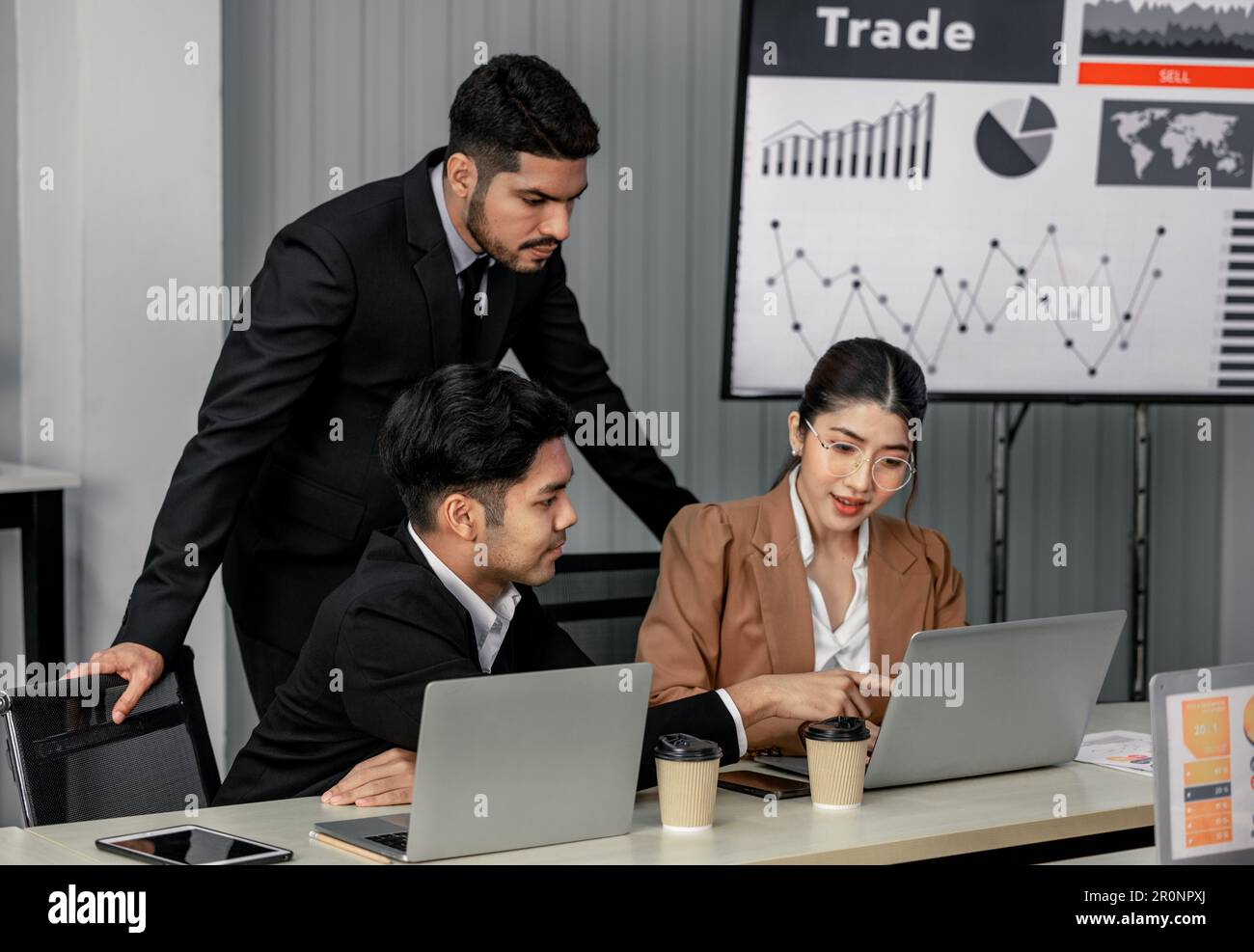Financial advisors collaborate to assess a company's financial ...