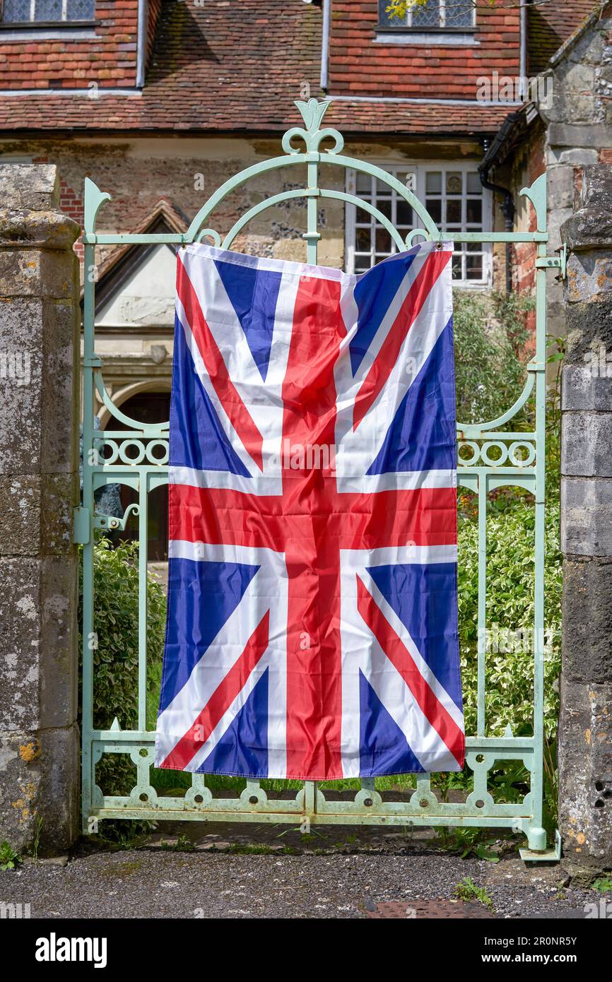 British Union Jack flag draped over a metal gate as part of the ...