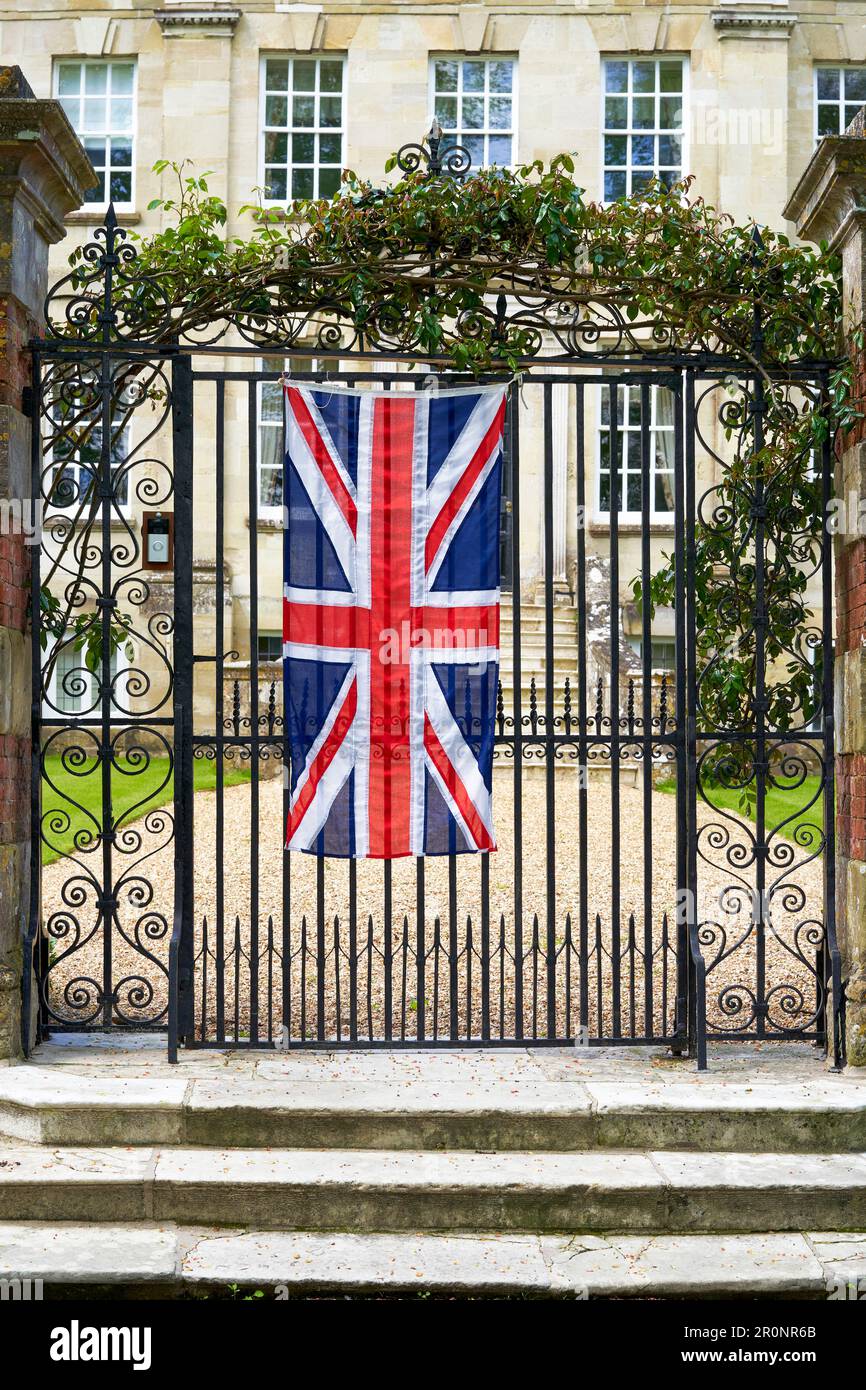 British Union Jack flag draped over a metal gate as part of the ...