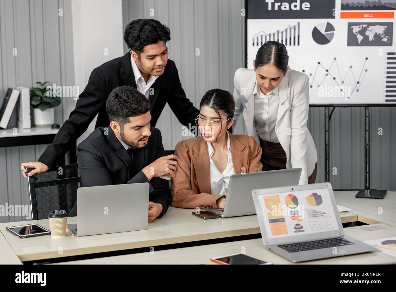 Financial advisors collaborate to assess a company's financial ...