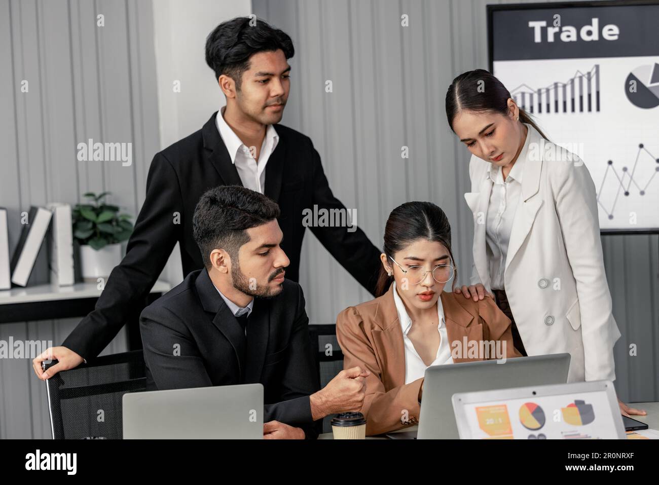 Financial advisors collaborate to assess a company's financial ...