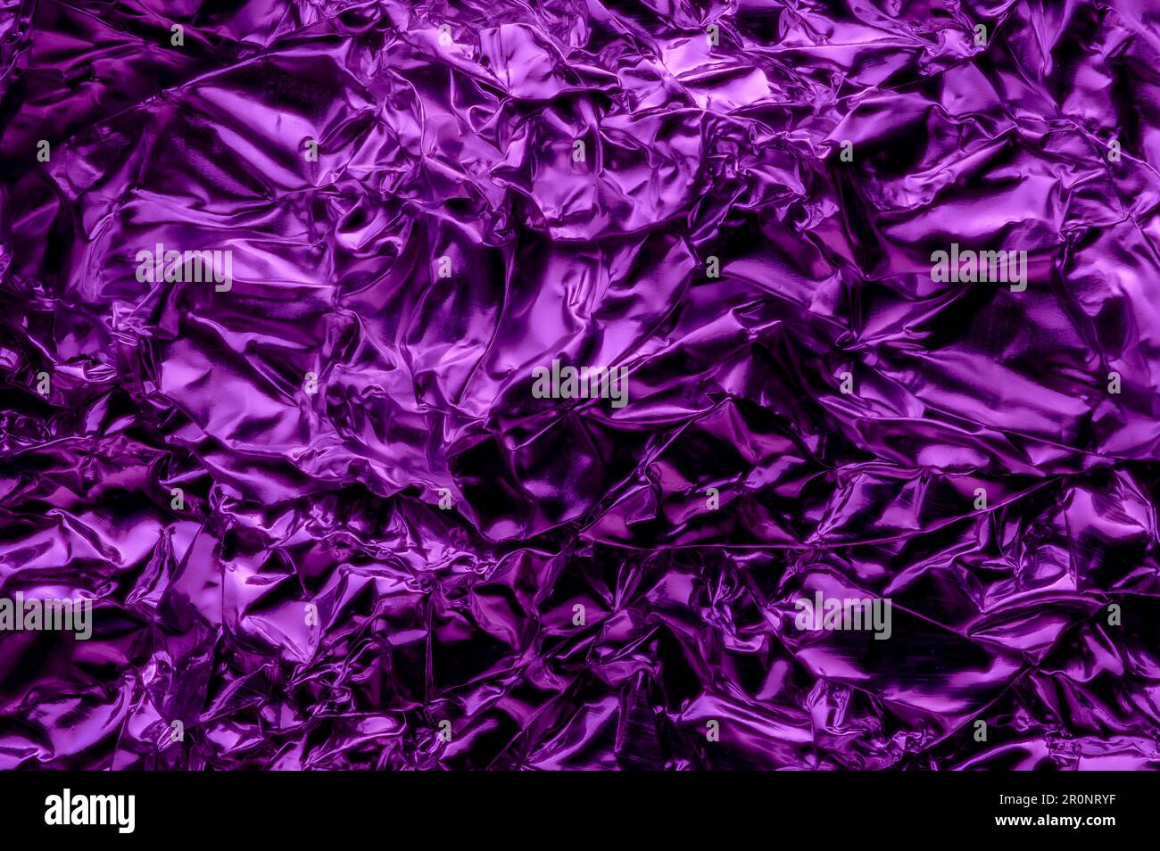 metallic purple colored texture background abstract. Aluminium crumpled ...