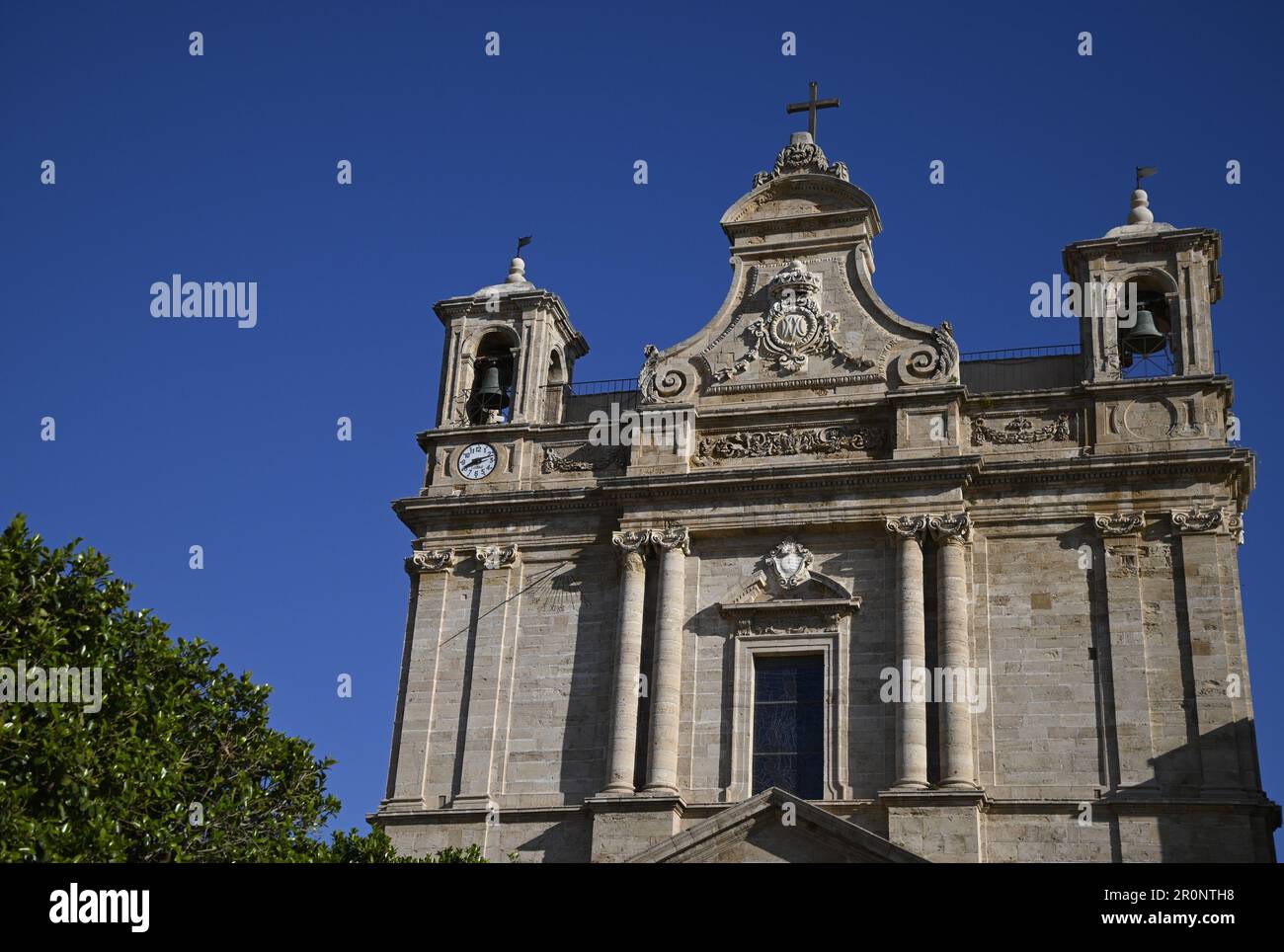 Landscape with scenic exterior view of the Baroque style La Parrocchia ...