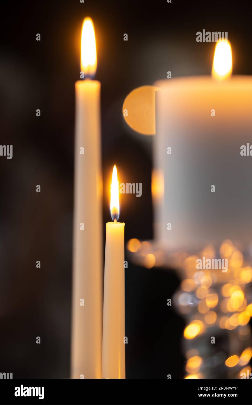Beautiful candle light wax candles lit in stunning wedding ceremony ...