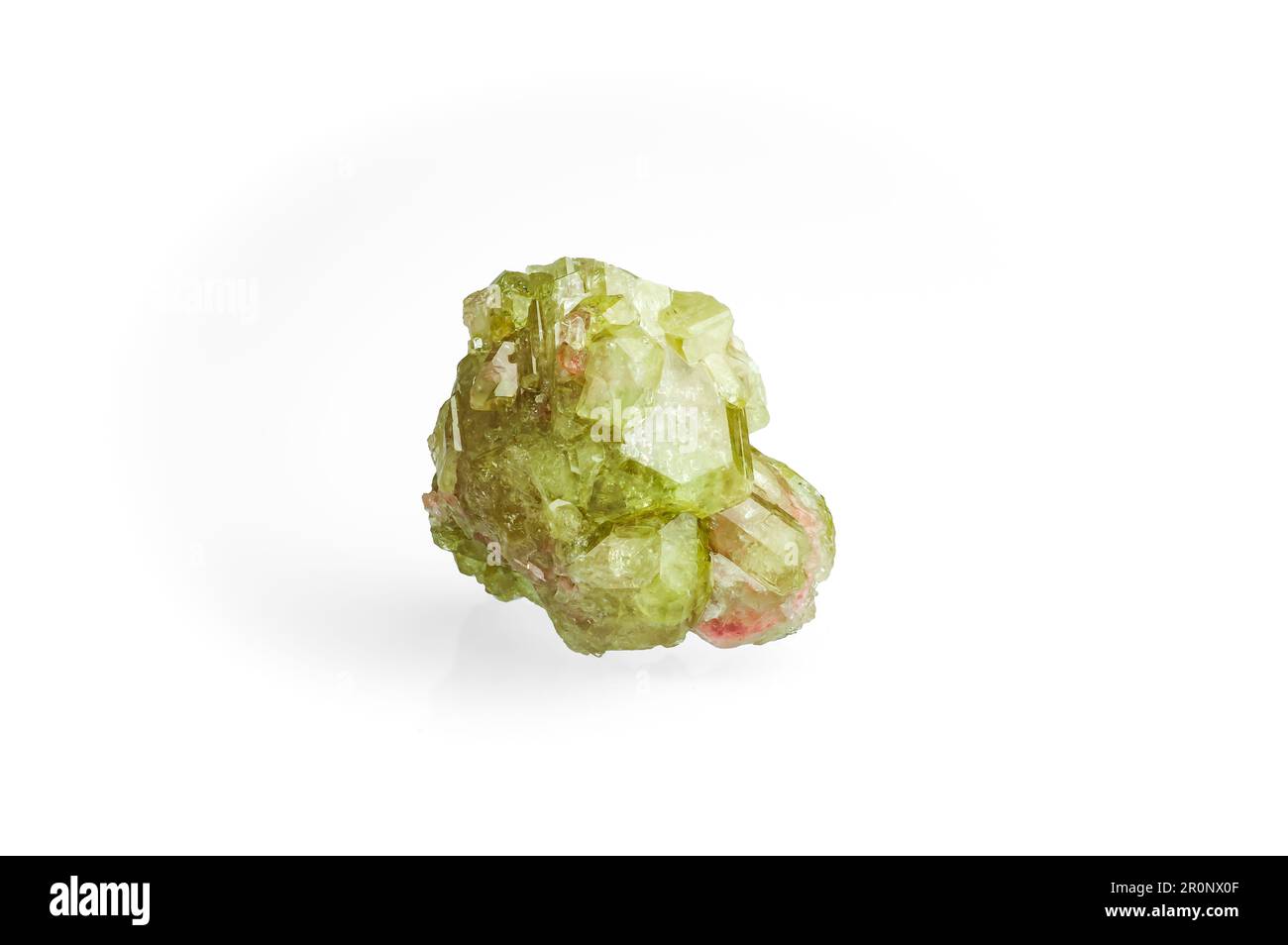 green vesuvianite (also known as idocrase) crystal isolated on white ...