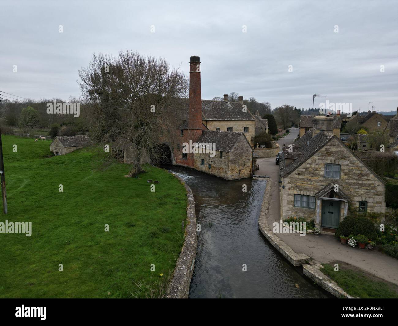 The old Mill Lower Slaughter quaint Cotswolds village England drone ...