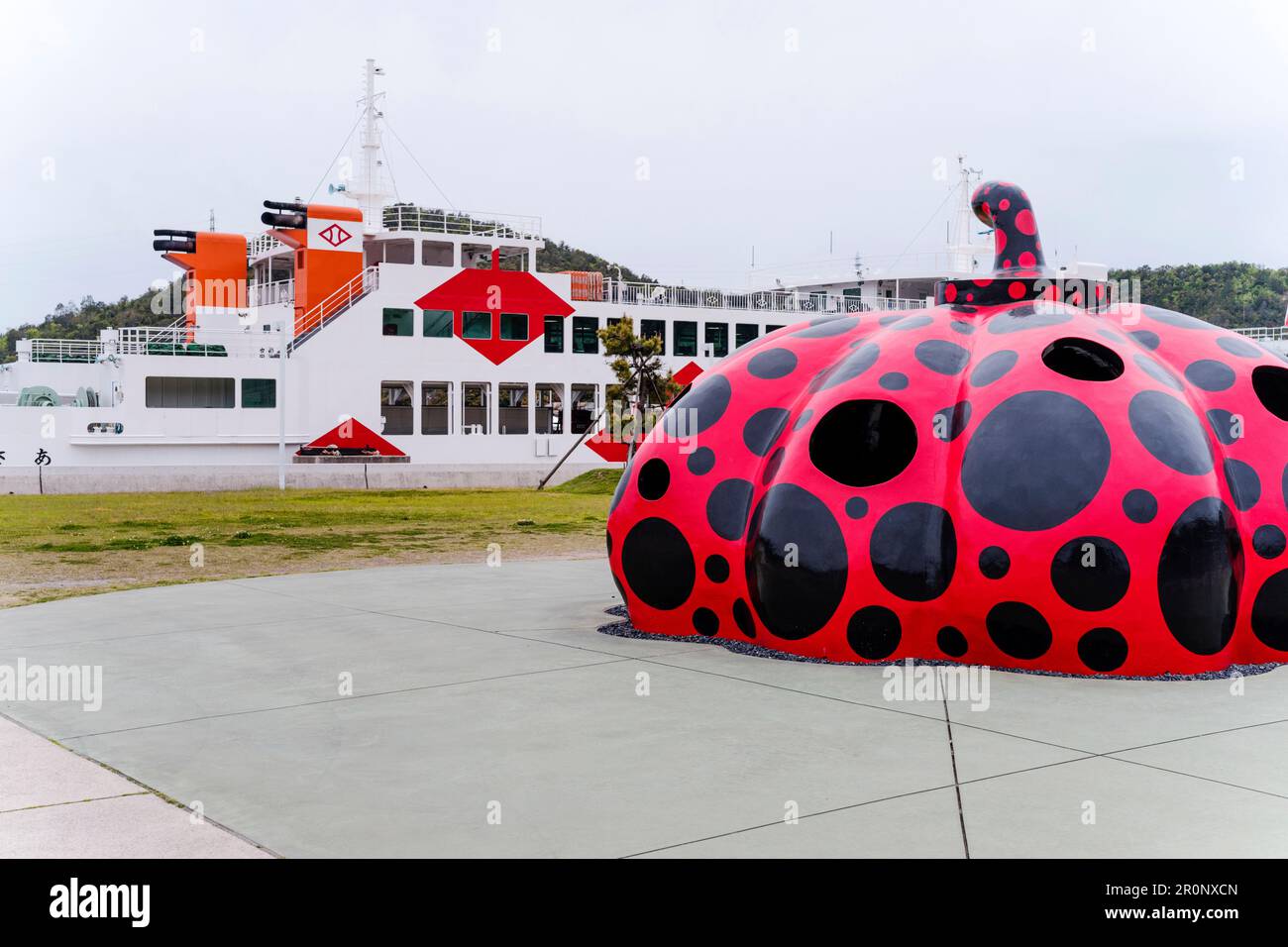 Red pumpkin sculpture by Japanese artist Yayoi Kusama in Miyanoura on ...