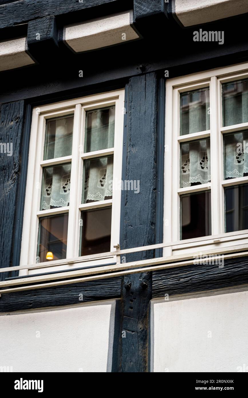 Windows of the old traditional medieval architecture with exposed beams ...