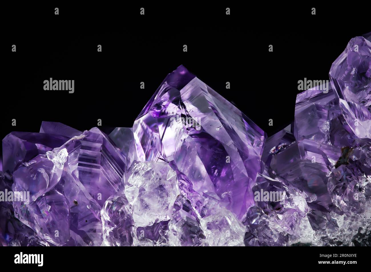 amehtyst violet crystal on black background. macro detail texture ...
