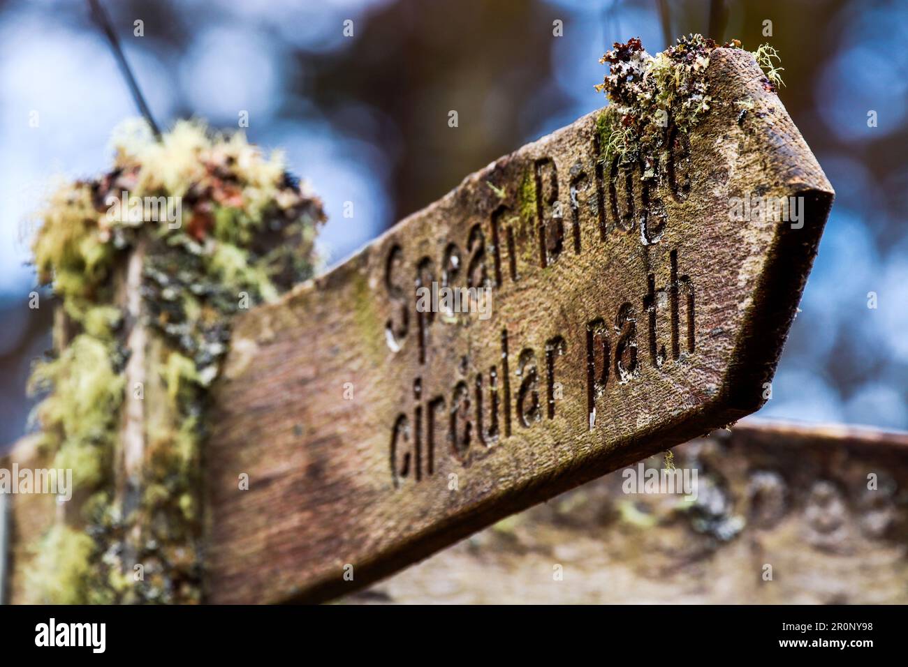 A wood sign with engraved words, 'Spean Bridge circular path' in a ...
