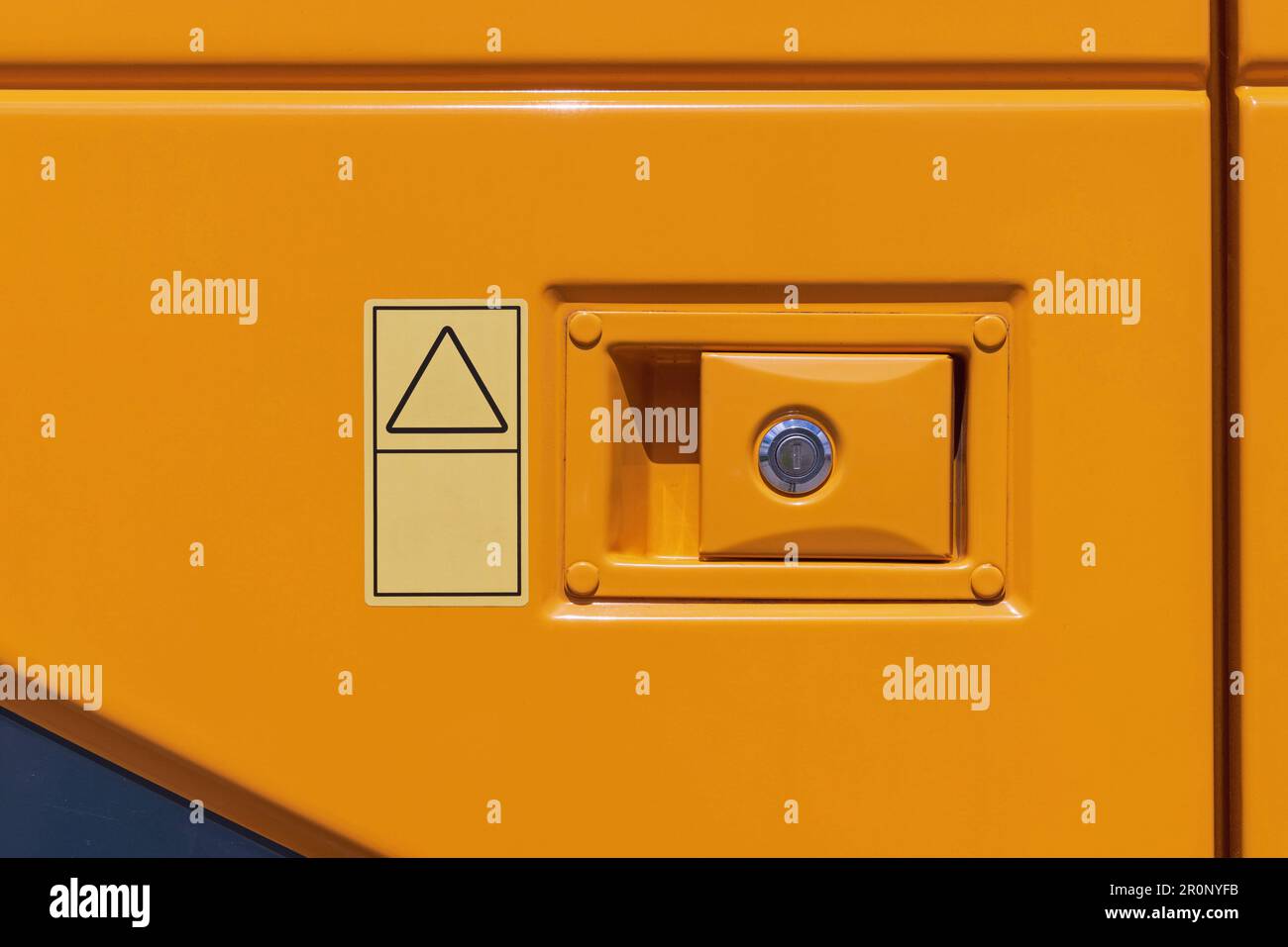 Latch With Lock at Yellow Construction Machine Vehicle Stock Photo - Alamy