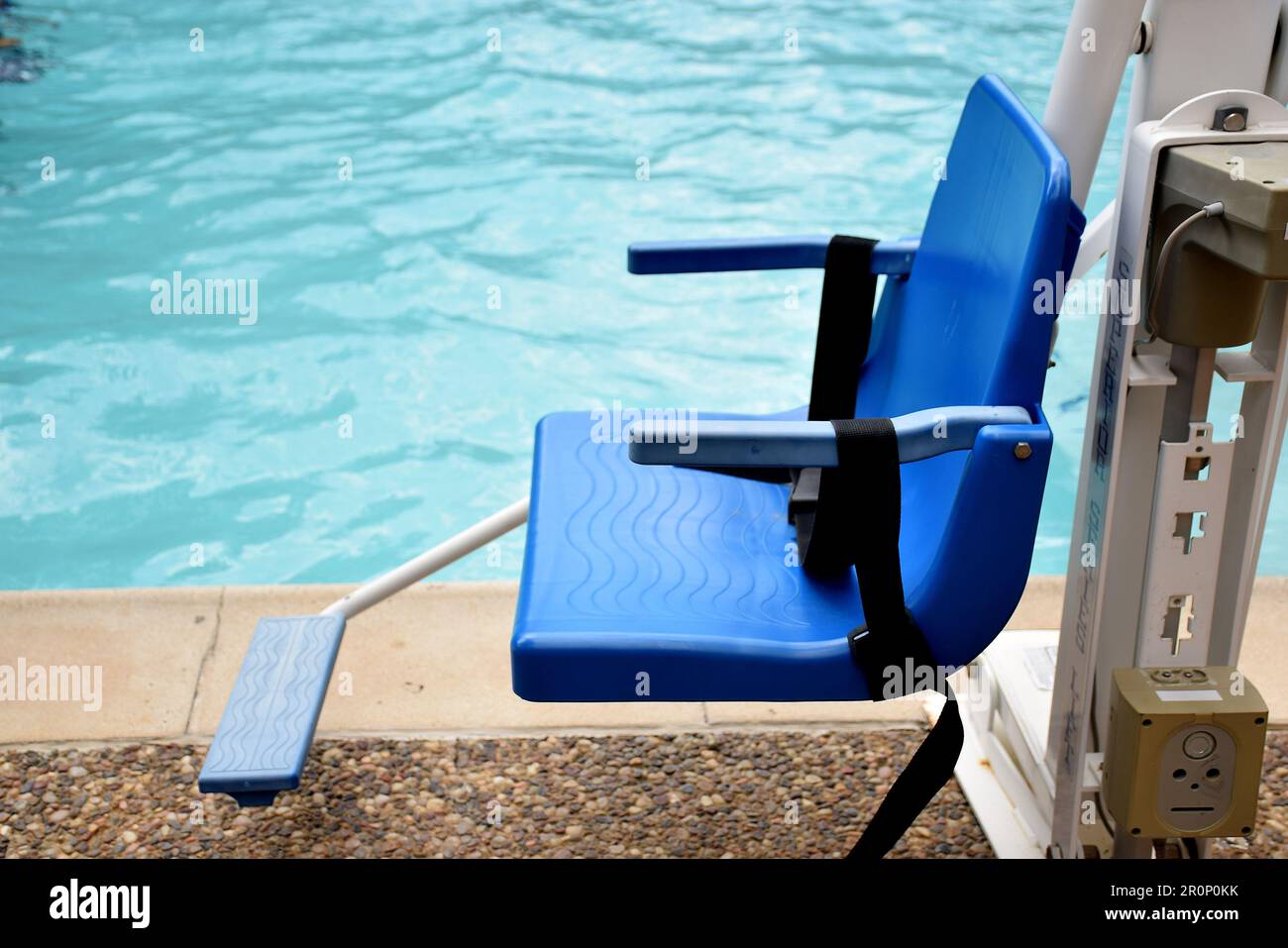A lifeguard chair near a swimming pool Stock Photo - Alamy