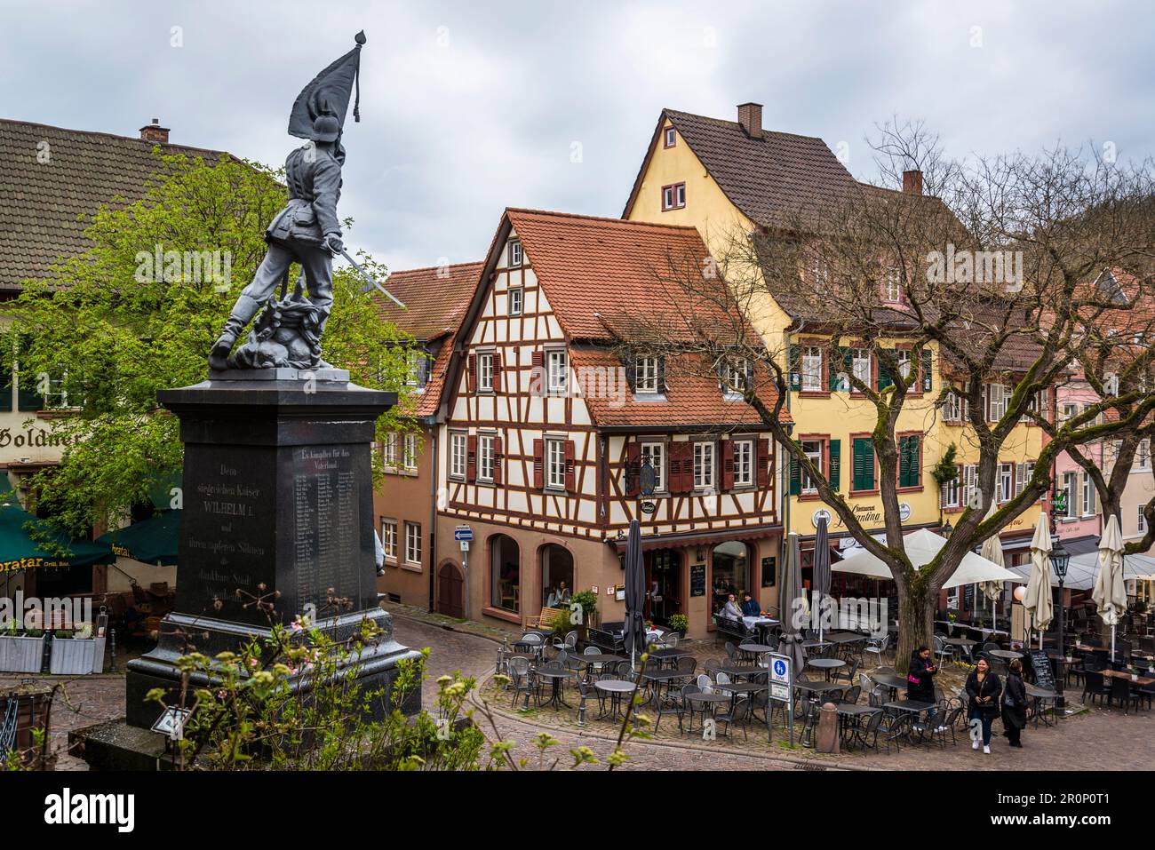 A war monument and the Market Square with restaurants and old ...