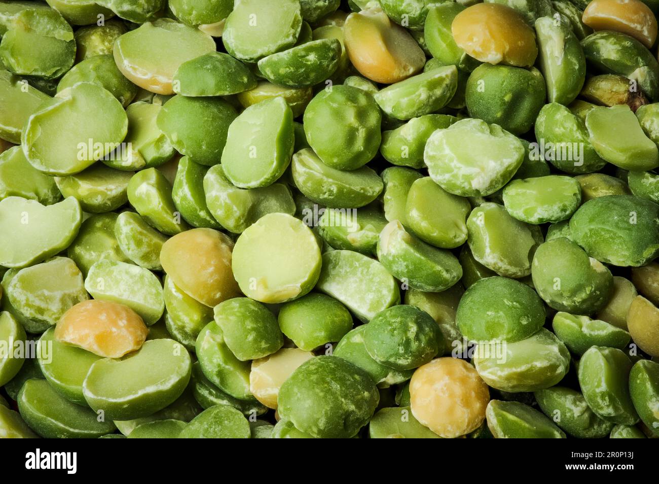 Dried green split peas (Pisum sativum) top view macro detail backdrop ...