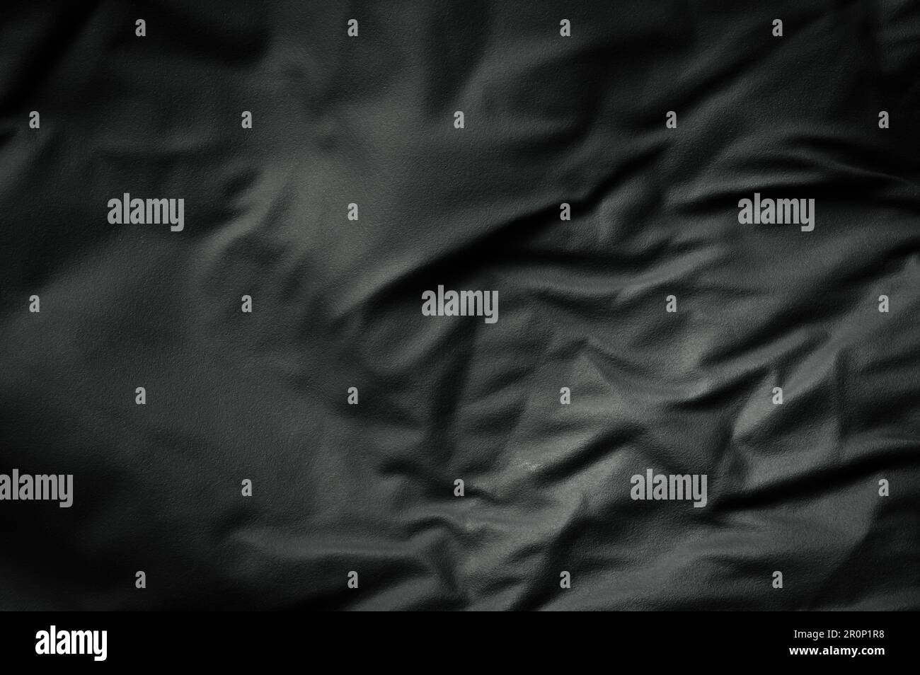 Nitrile black glove texture detail Stock Photo - Alamy