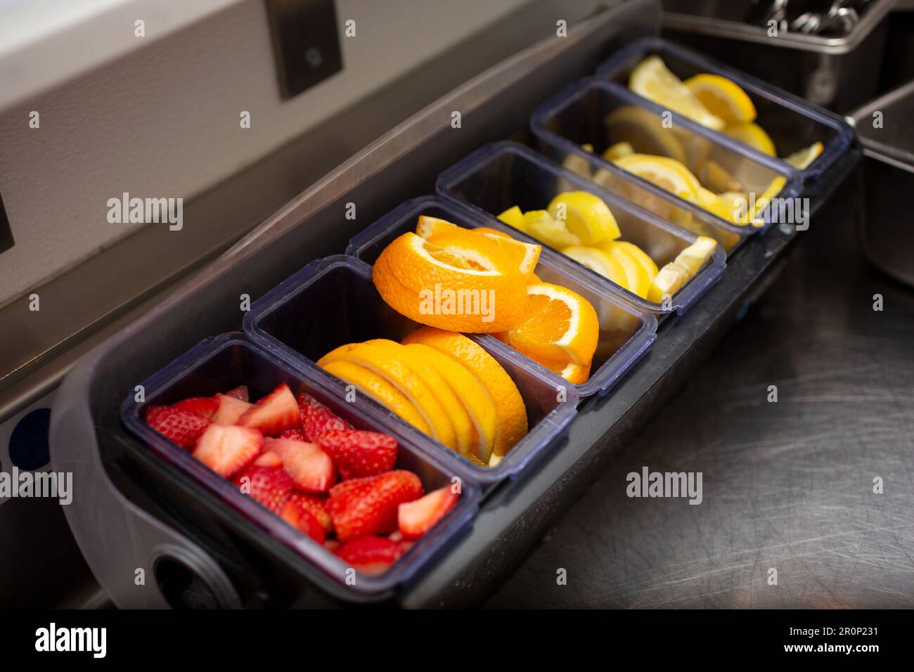 A view of a condiment station container, featuring a variety of ...