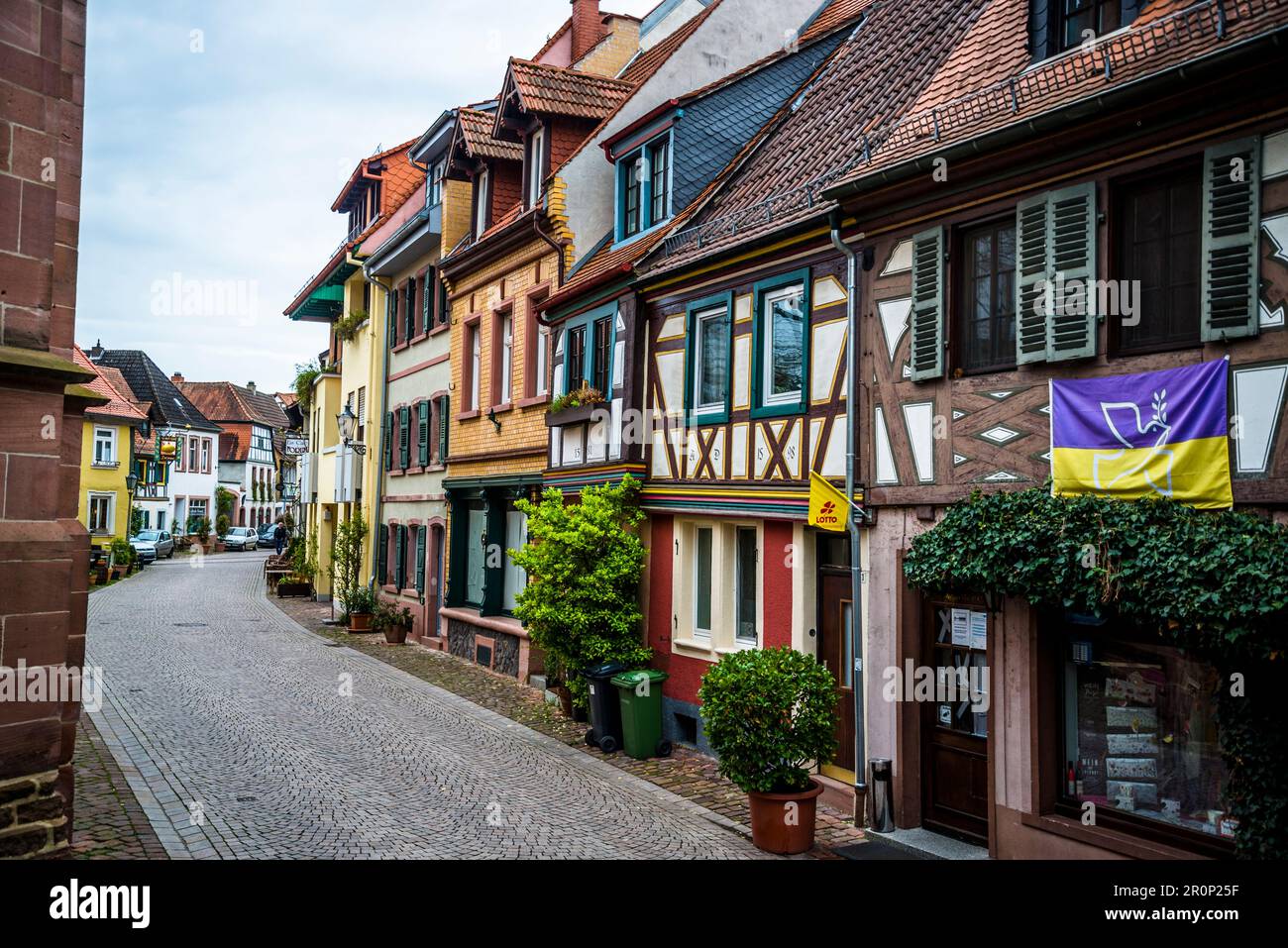Street with the old traditional medieval architecture with exposed ...