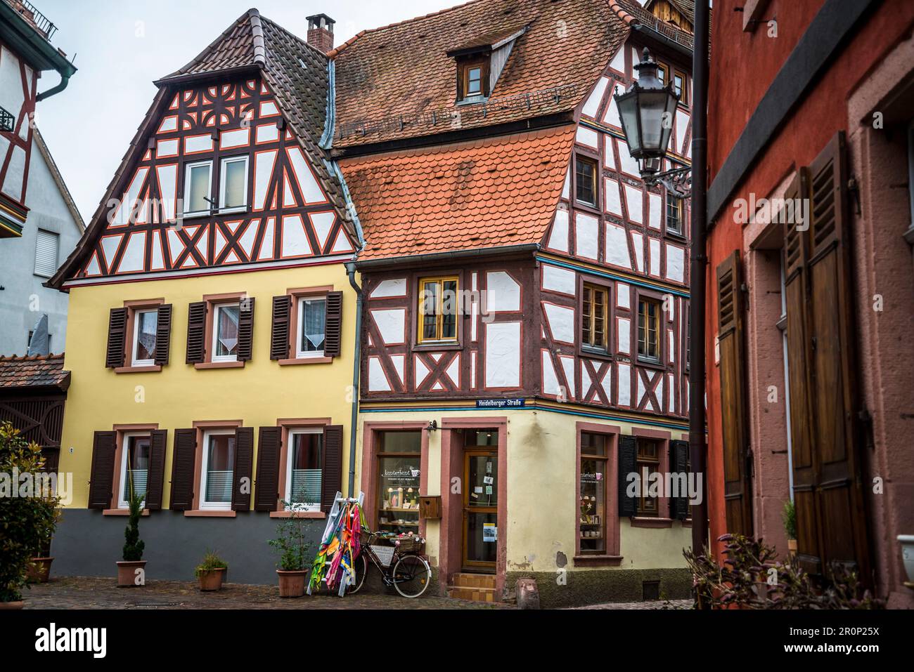 Street with the old traditional medieval architecture with exposed ...