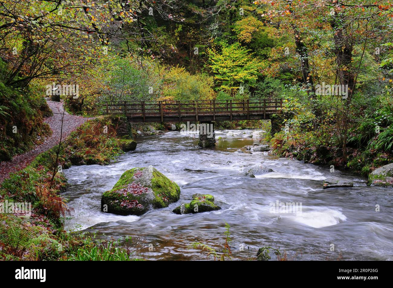 Foot bridge at Watersmeet, Exmoor National Park in autumn Stock Photo ...