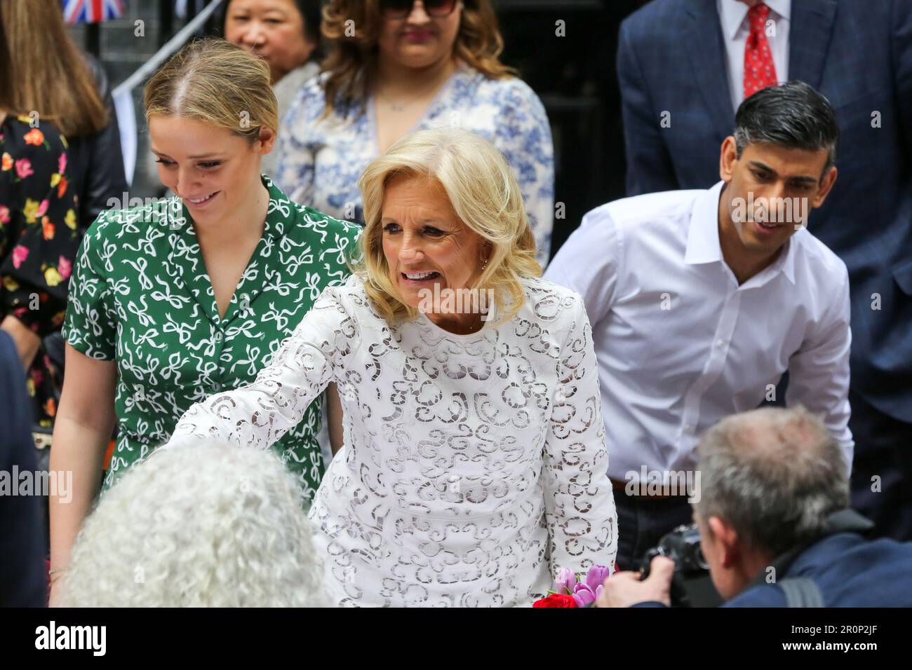 First lady, Jill Biden speaks with the guests as Finnegan Biden and ...