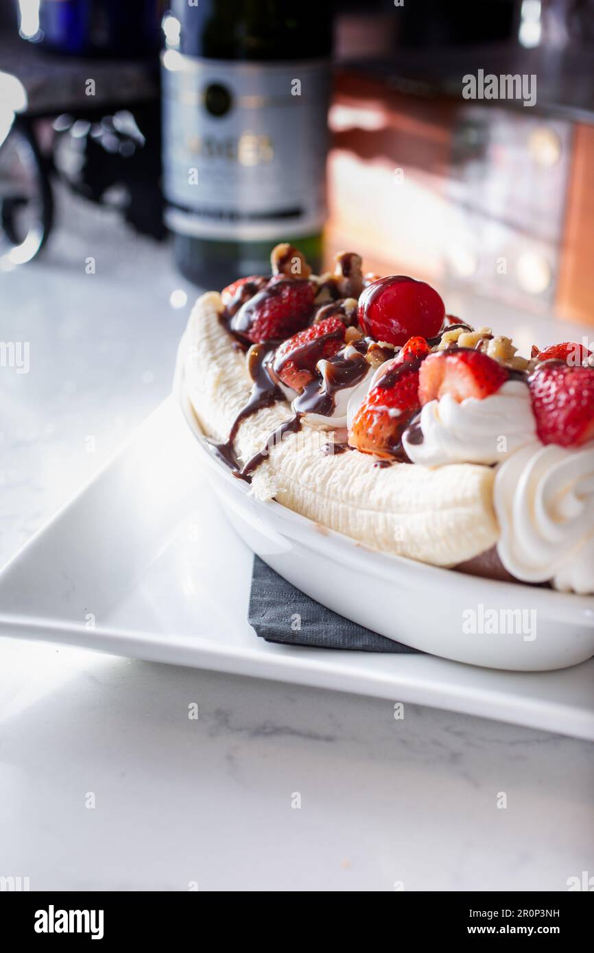 A view of a banana split on a counter surface Stock Photo - Alamy
