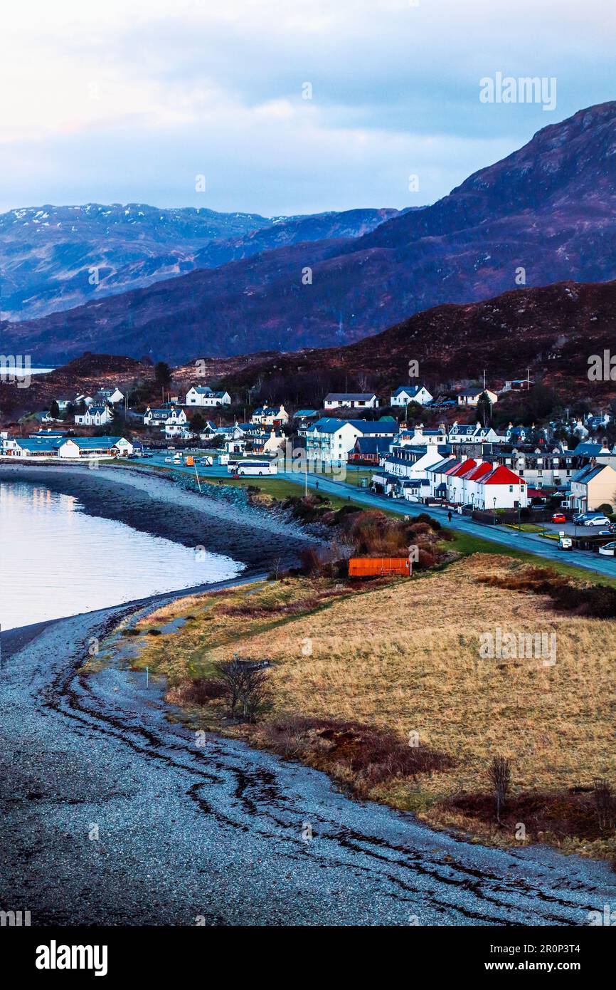 A small village is situated amongst majestic mountains in Kyle of ...