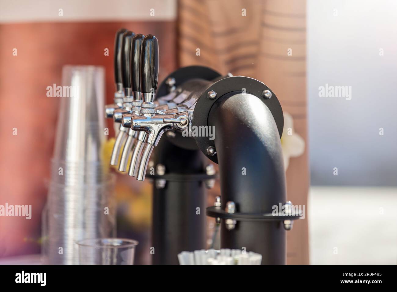 Handmade beer faucet. Bar counter in a pub with a beer tap, side view ...