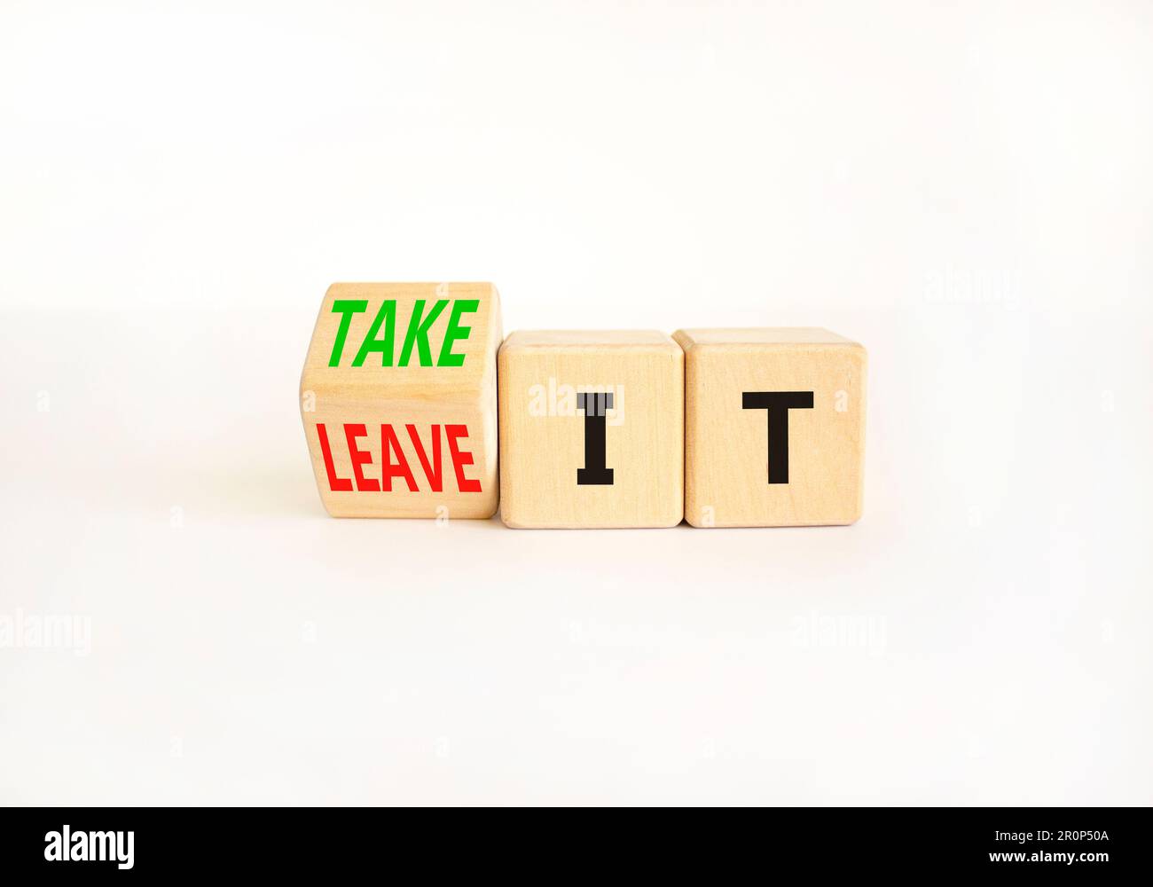 Take or leave it symbol. Businessman turns wooden cubes and changes ...