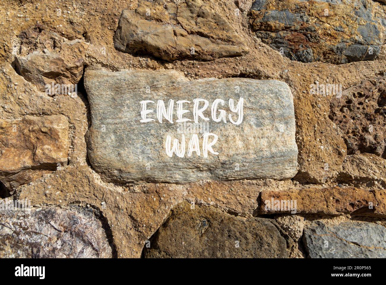 Energy war symbol. Concept words Energy war on beautiful big grey stone ...