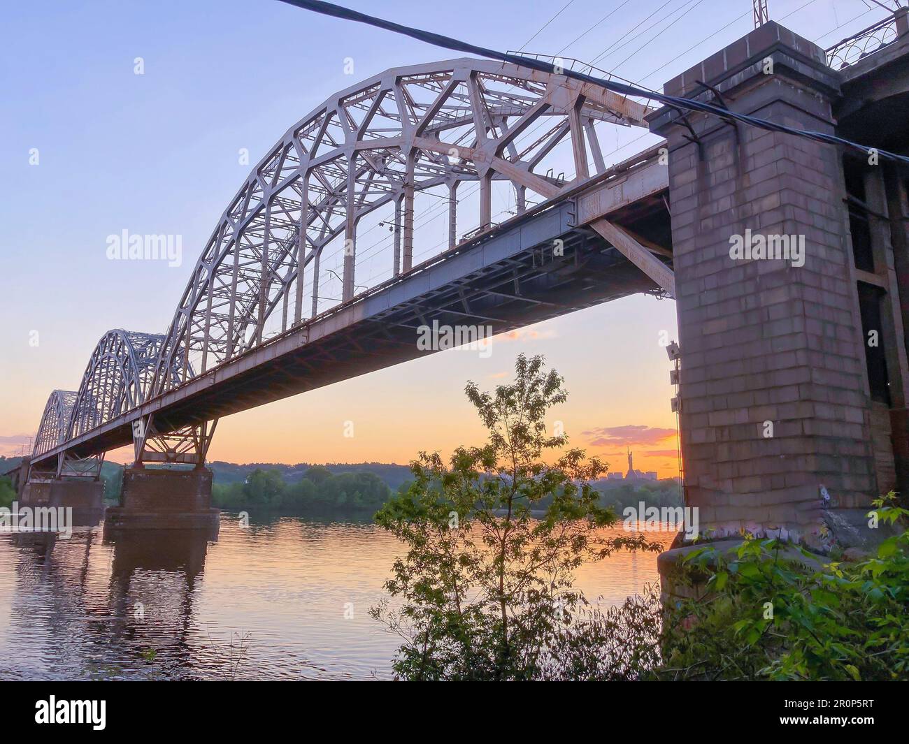 New Darnytskyi Bridge across Dnipro river in Kyiv, Ukraine on sunset ...