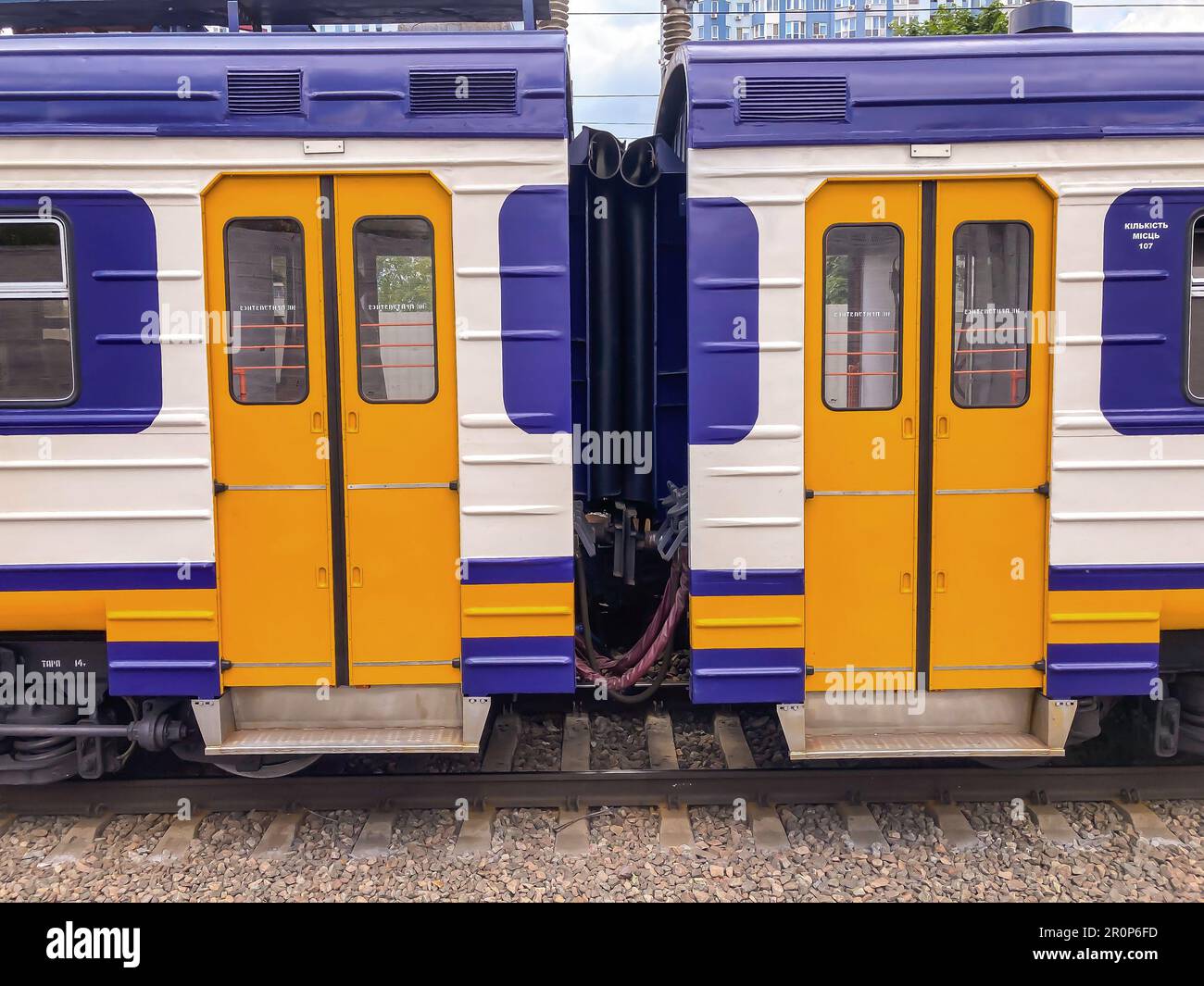 The yellow doors of the Kiev city train. The inscription Do not lean on ...
