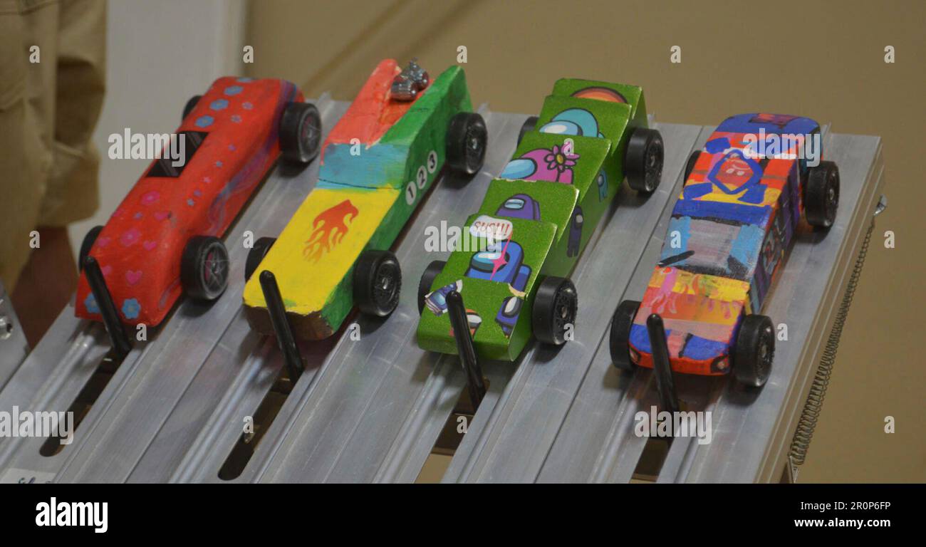 The Pinewood Derby cars are lined up and ready to race during the ...