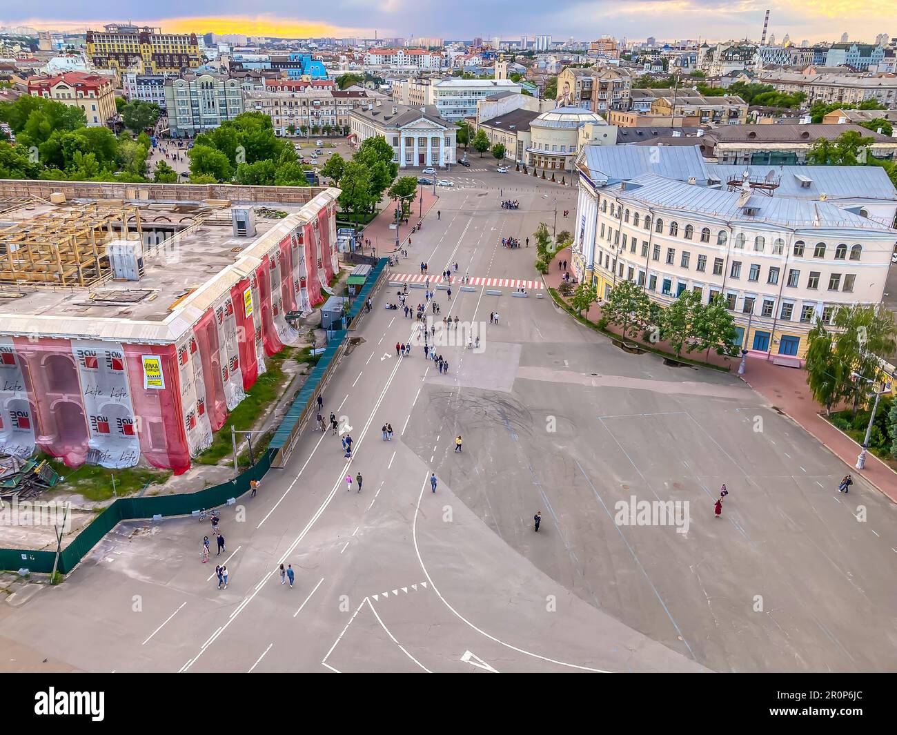 People walking along square, aerial scene. A view of the town square ...