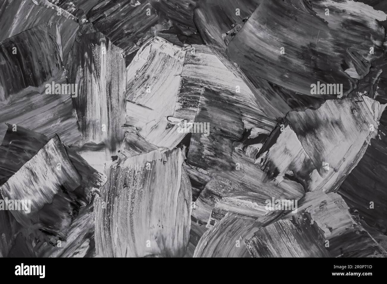 An array of black and white spatula strokes abstract paining arranged ...