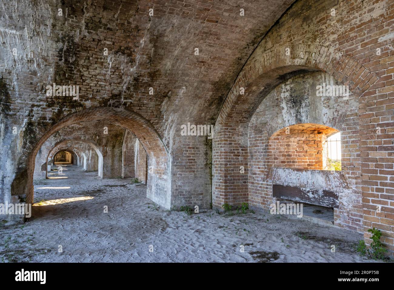 Limestone leaks onto the brick arches and walls of an exterior casemate ...