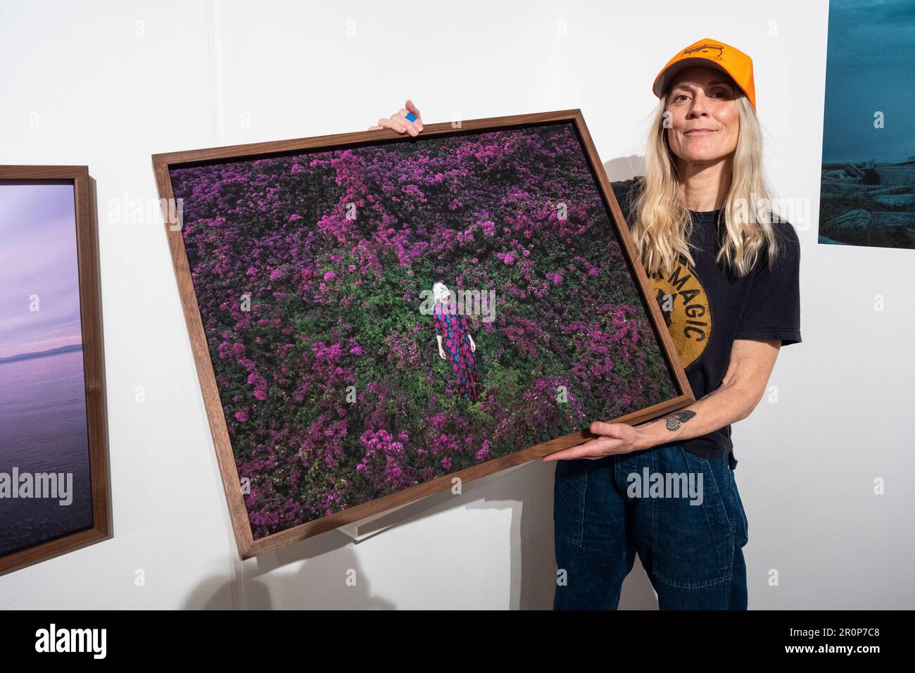 London, UK. 9 May 2023. Photographer Bootsy Holler with a works from ...